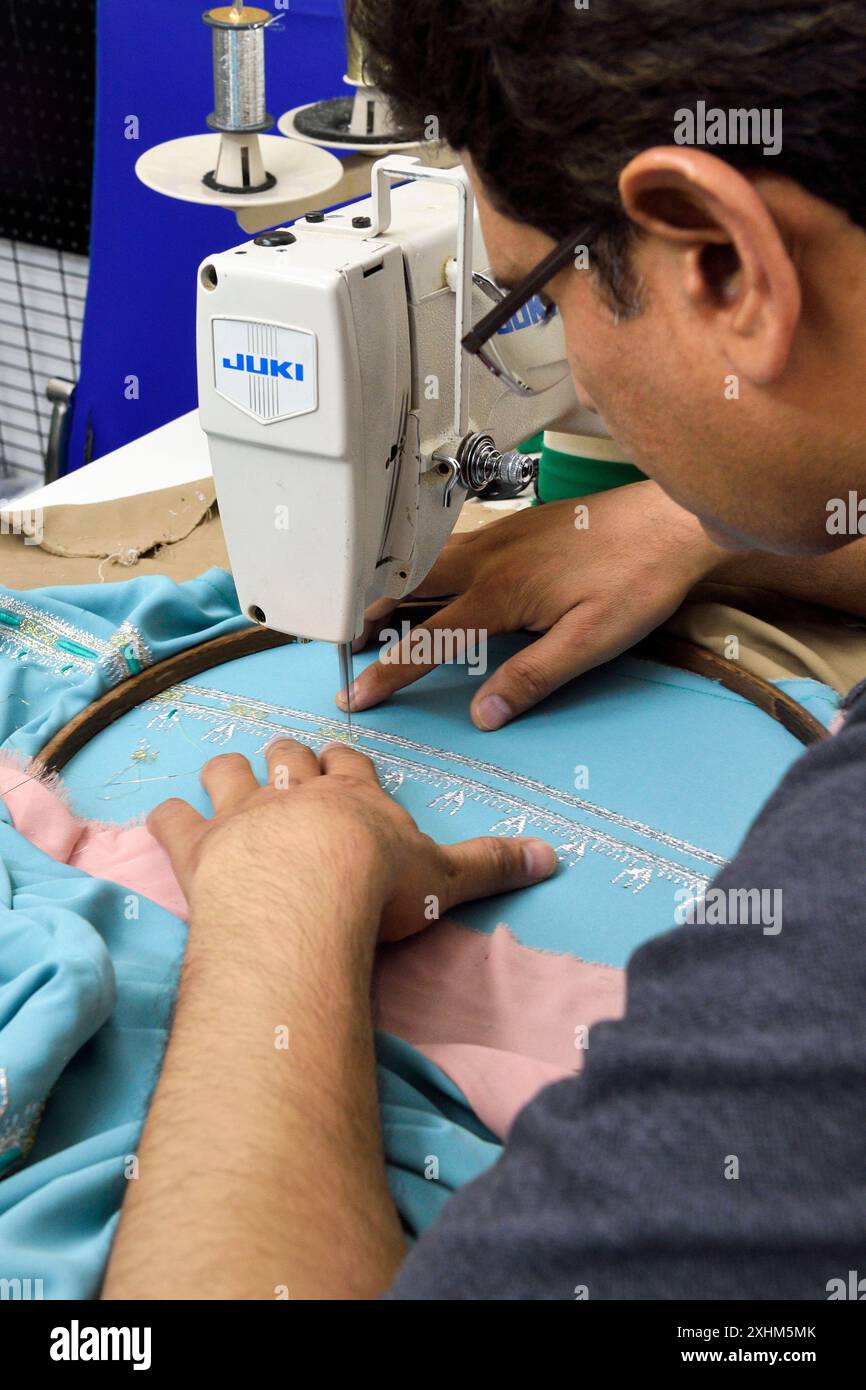 Sultanate of Oman, Muscat, Al-Athaiba district, haute couture workshop ...