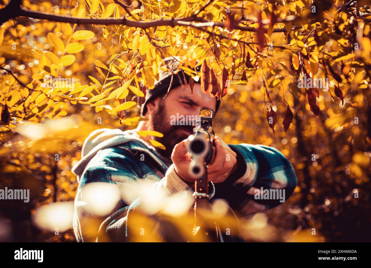 Close up snipers carbine at the outdoor hunting. Hunter with shotgun ...