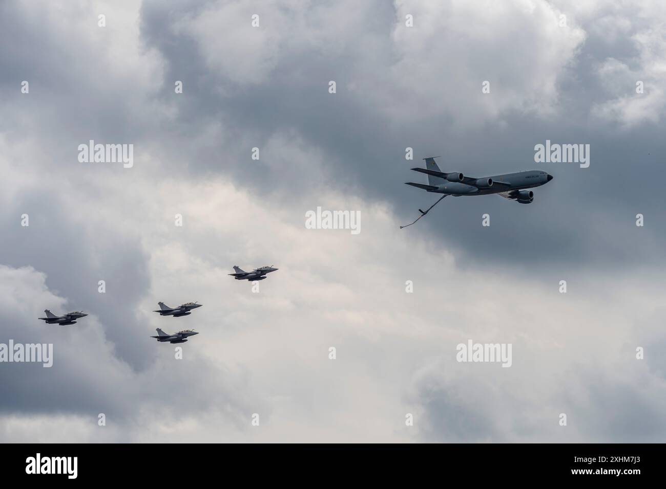 Paris, France - 07 14 2024: Air show of July 14. Military planes flying ...