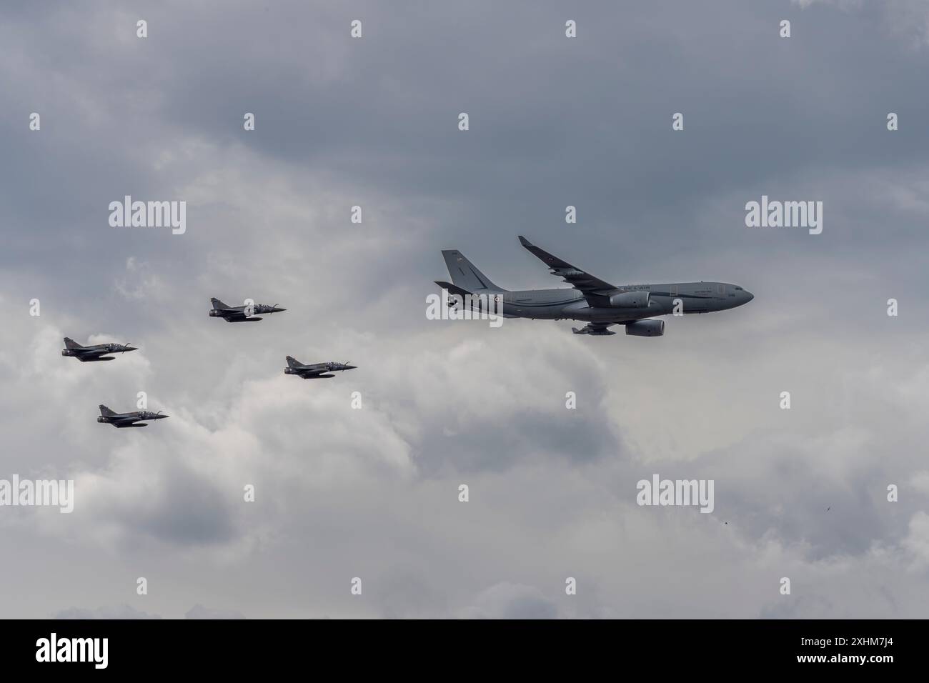 Paris, France - 07 14 2024: Air show of July 14. Military planes flying ...
