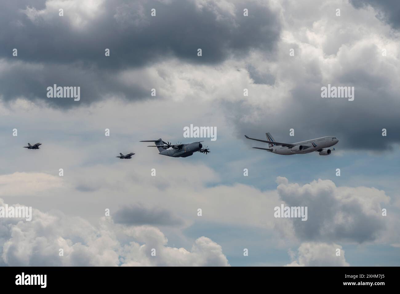 Paris, France - 07 14 2024: Air show of July 14. Military planes flying ...