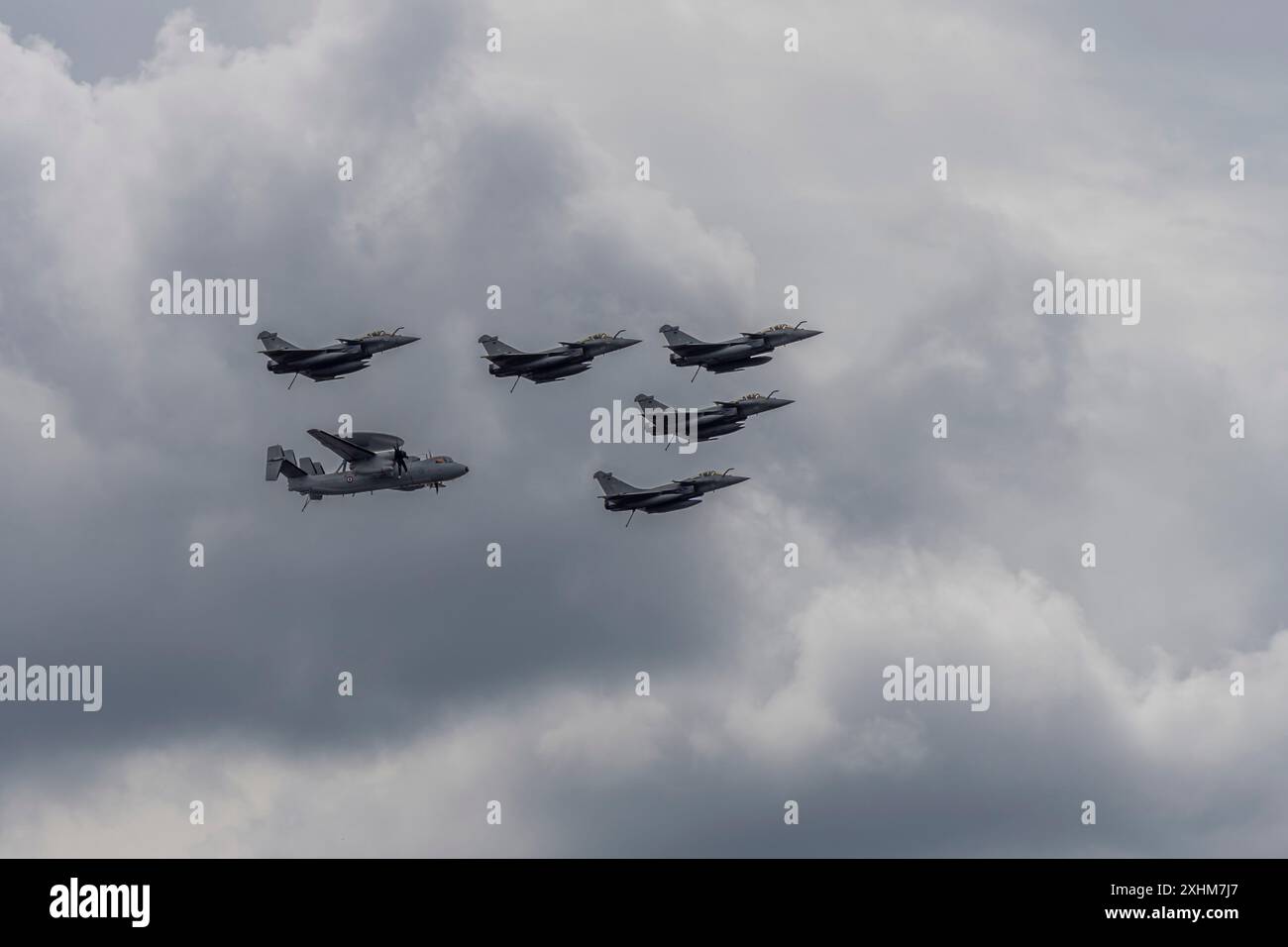 Paris, France - 07 14 2024: Air show of July 14. Military planes flying ...