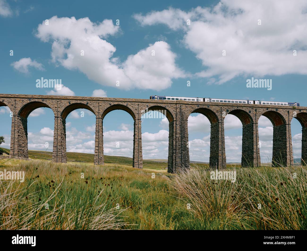 A Northern Rail passenger train Ribblehead Viaduct on the Settle and ...