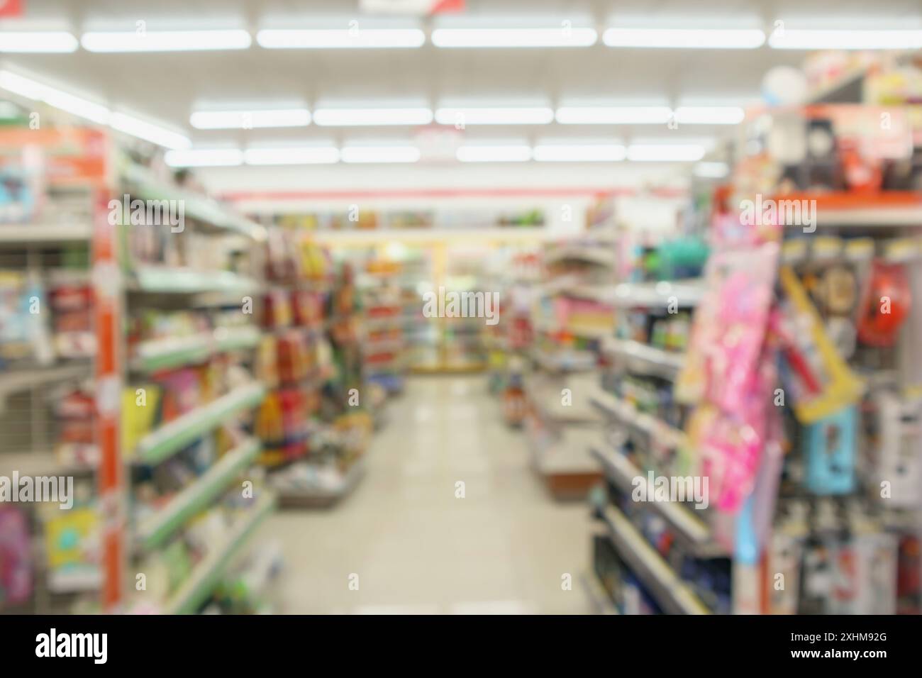 convenience store shelves interior blur for background Stock Photo - Alamy