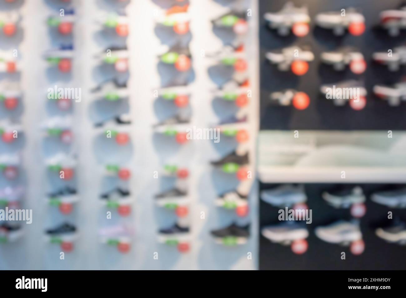 sneakers showcase on shelves in sport shoes store window display ...