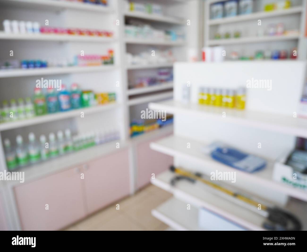 pharmacy store with blur medicines arranged on shelves Stock Photo - Alamy
