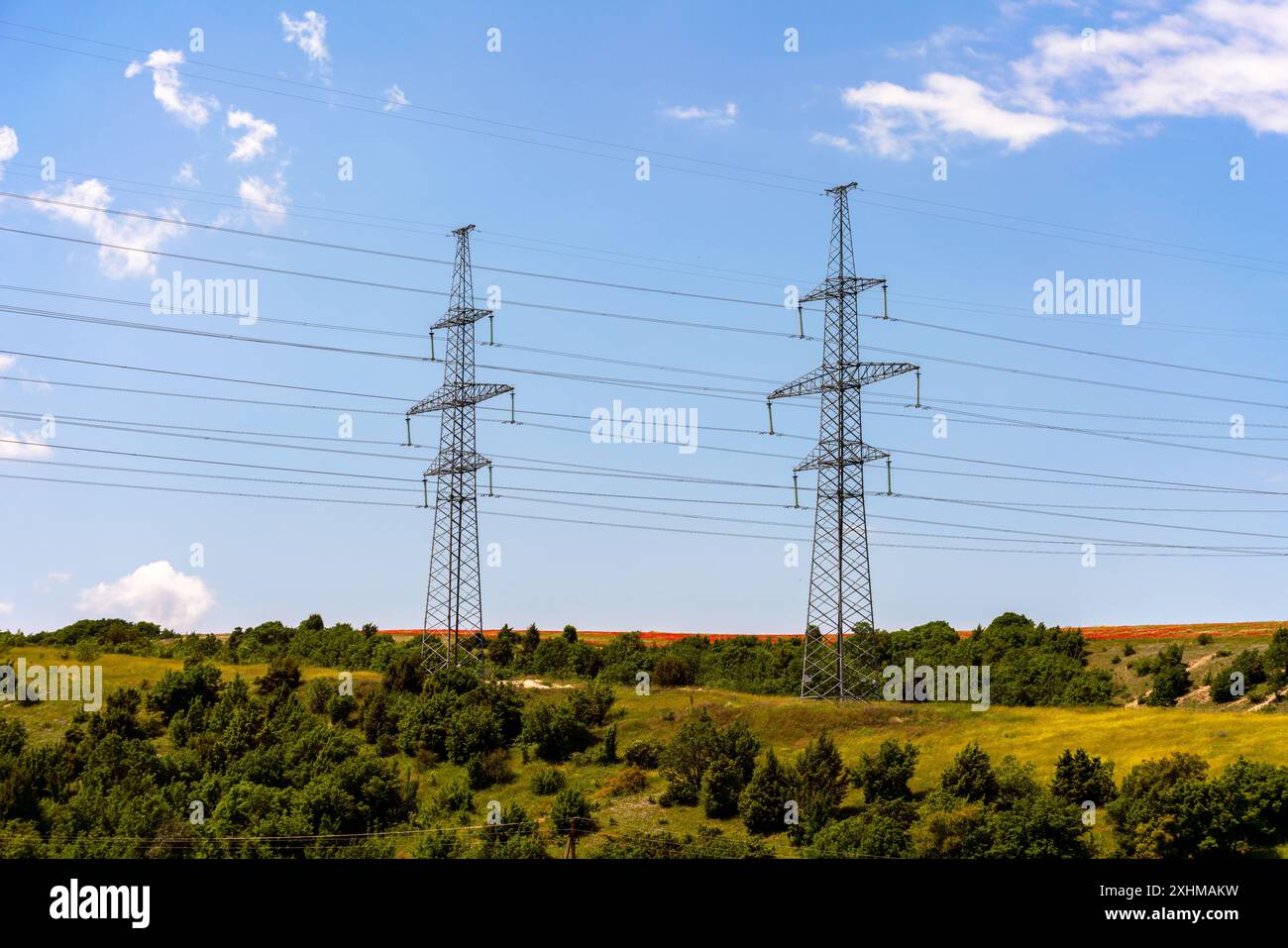 High voltage towers Electric pole. Power line support with wires for ...