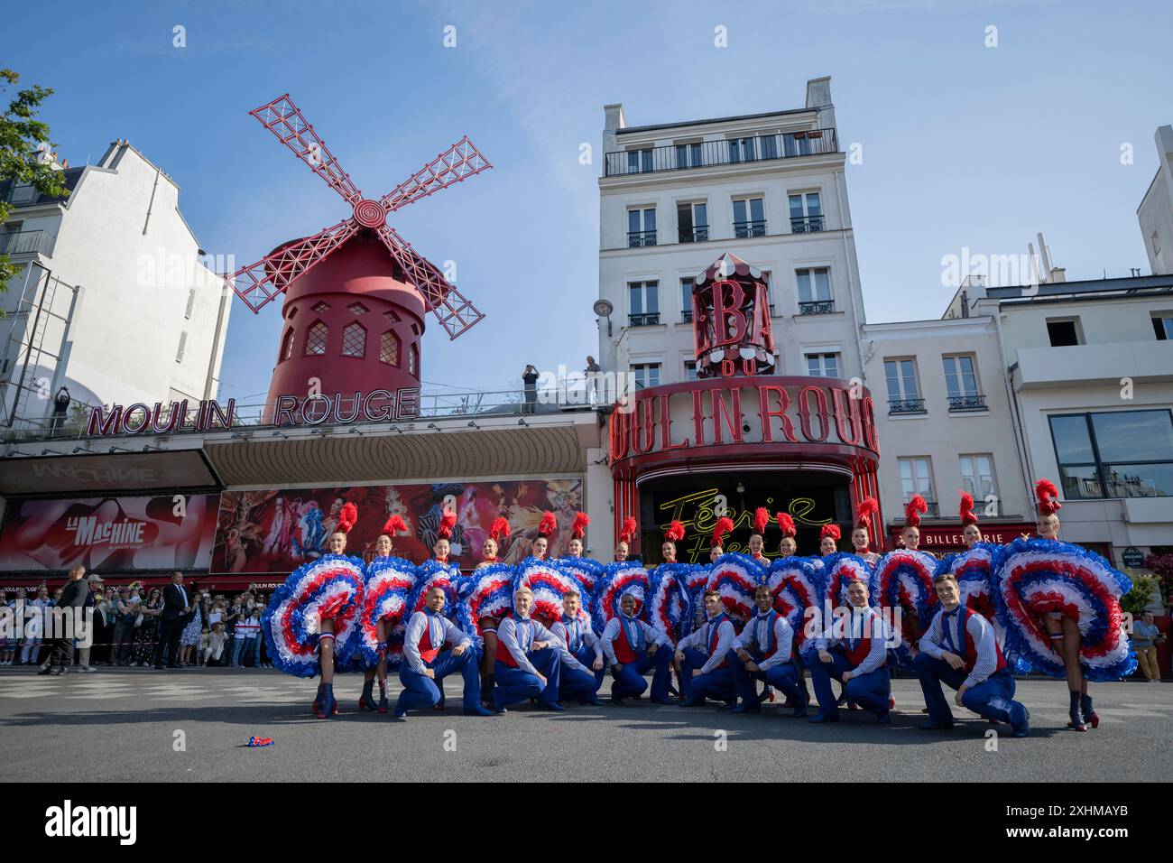 Paris, France. 15th July, 2024. Dancers from the Moulin Rouge cabaret ...