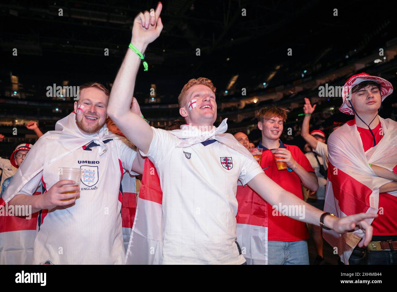 London, 14th July 2024. England fans at the O2 Greenwich watch the ...