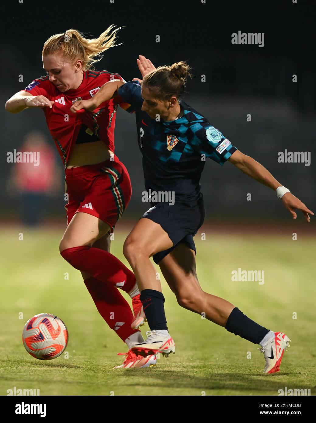 KARLOVAC, CROATIA - 12 JULY 2024: Wales' Ceri Holland battles for the ...