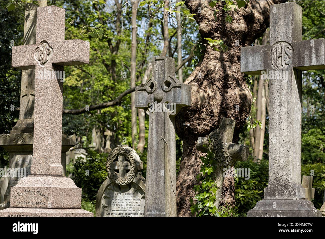 Several different styles of stone crosses mark graves in Highgate ...