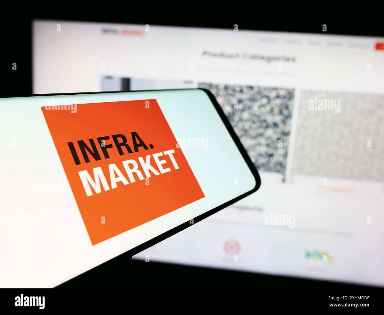 Cellphone with logo of Indian company Hella Infra Market Pvt. Ltd ...