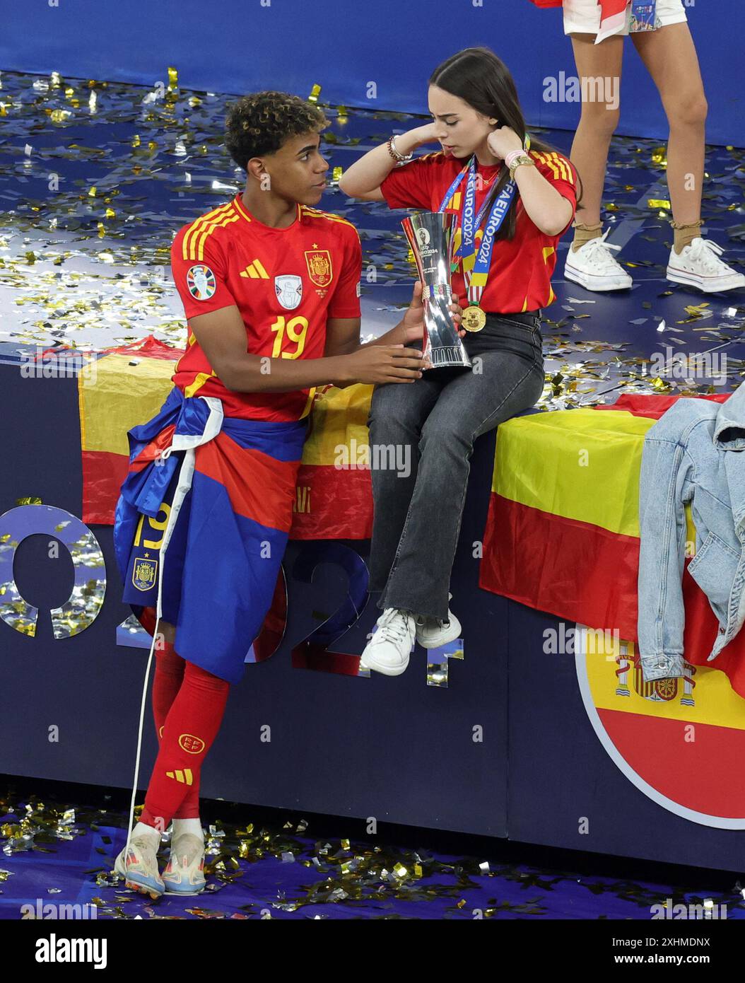 BERLIN, GERMANY - JULY 14: Lamine Yamal of Spain shows his girlfriend Alex Padilla his MVP ...