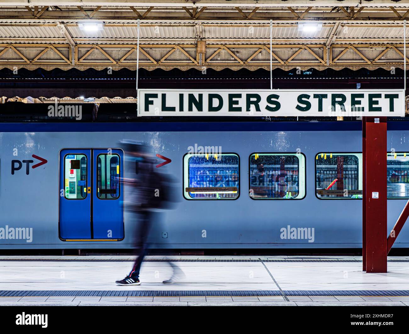 Flinders Street Station platform with train and passenger Melbourne Stock Photo - Alamy