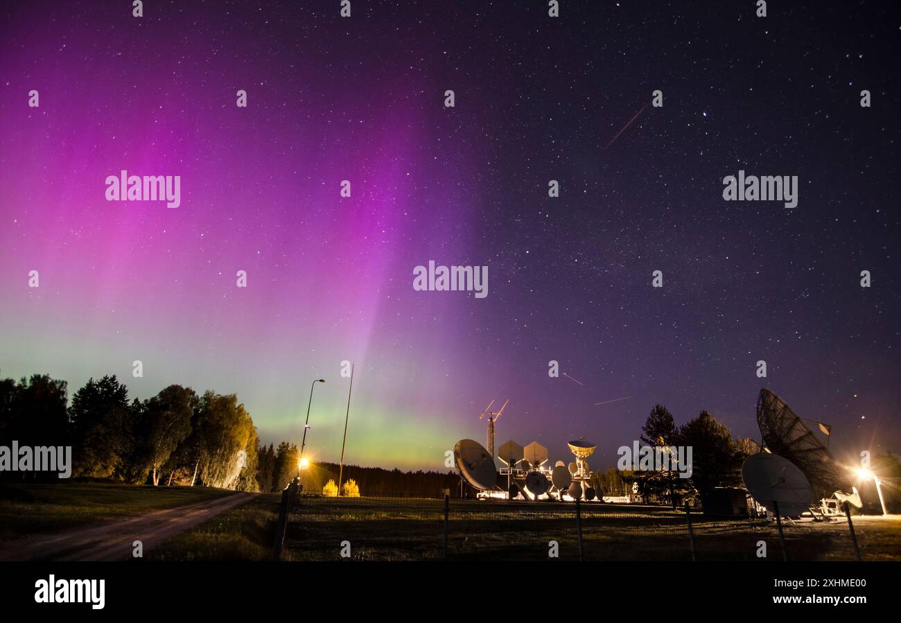 Northern Lights Aurora Borealis over Satellite Earth Stations. Magnetic ...