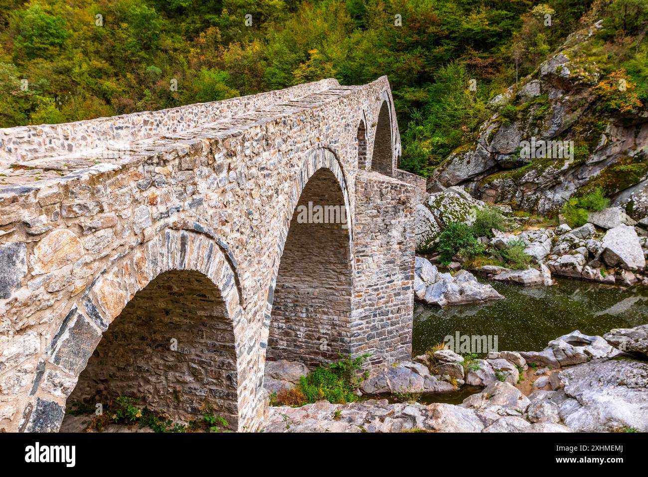 Devil's bridge is three-arched bridge over the Arda River in a narrow gorge part of an ancient ...