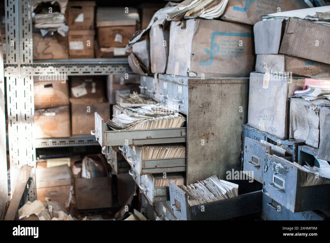 Abandoned archive room with open, rusty file cabinets Stock Photo - Alamy