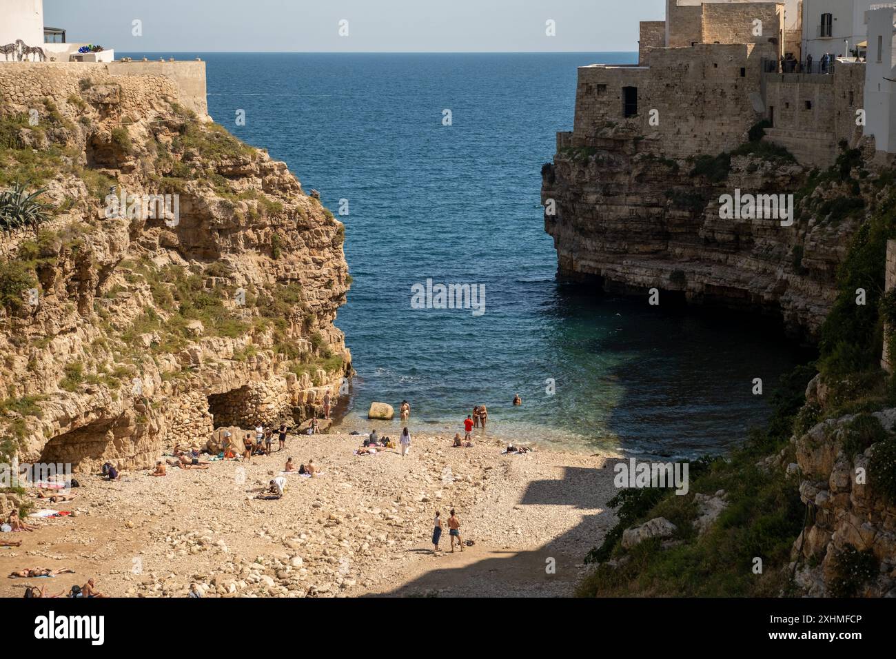 People Enjoying the Polignano a Mare Beach, Puglia, Italy Stock Photo ...