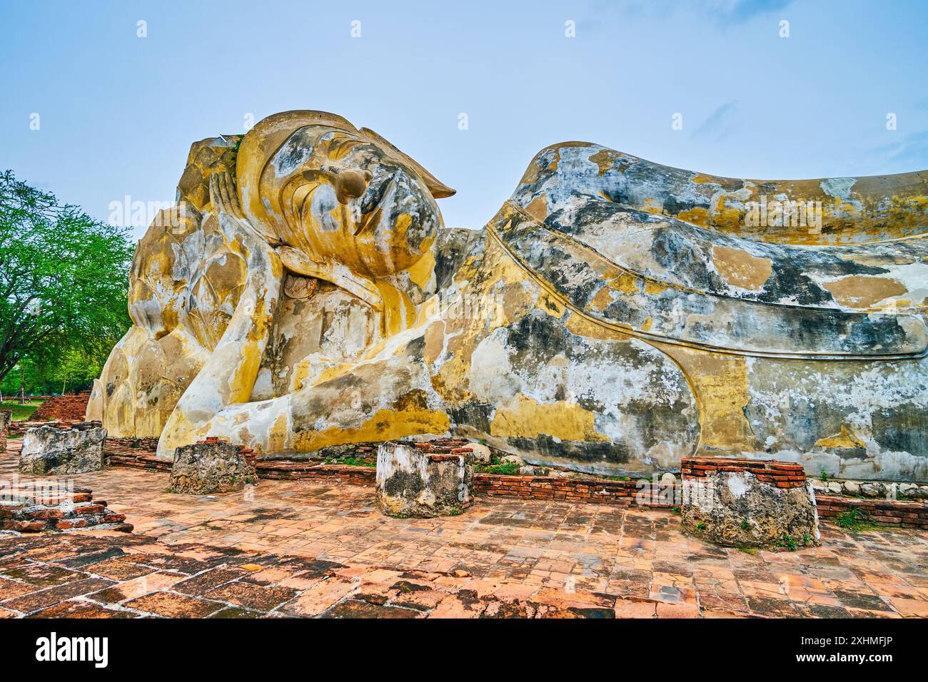 The giant statue of Reclining Buddha, named Wat Lokaya Sutha in ...