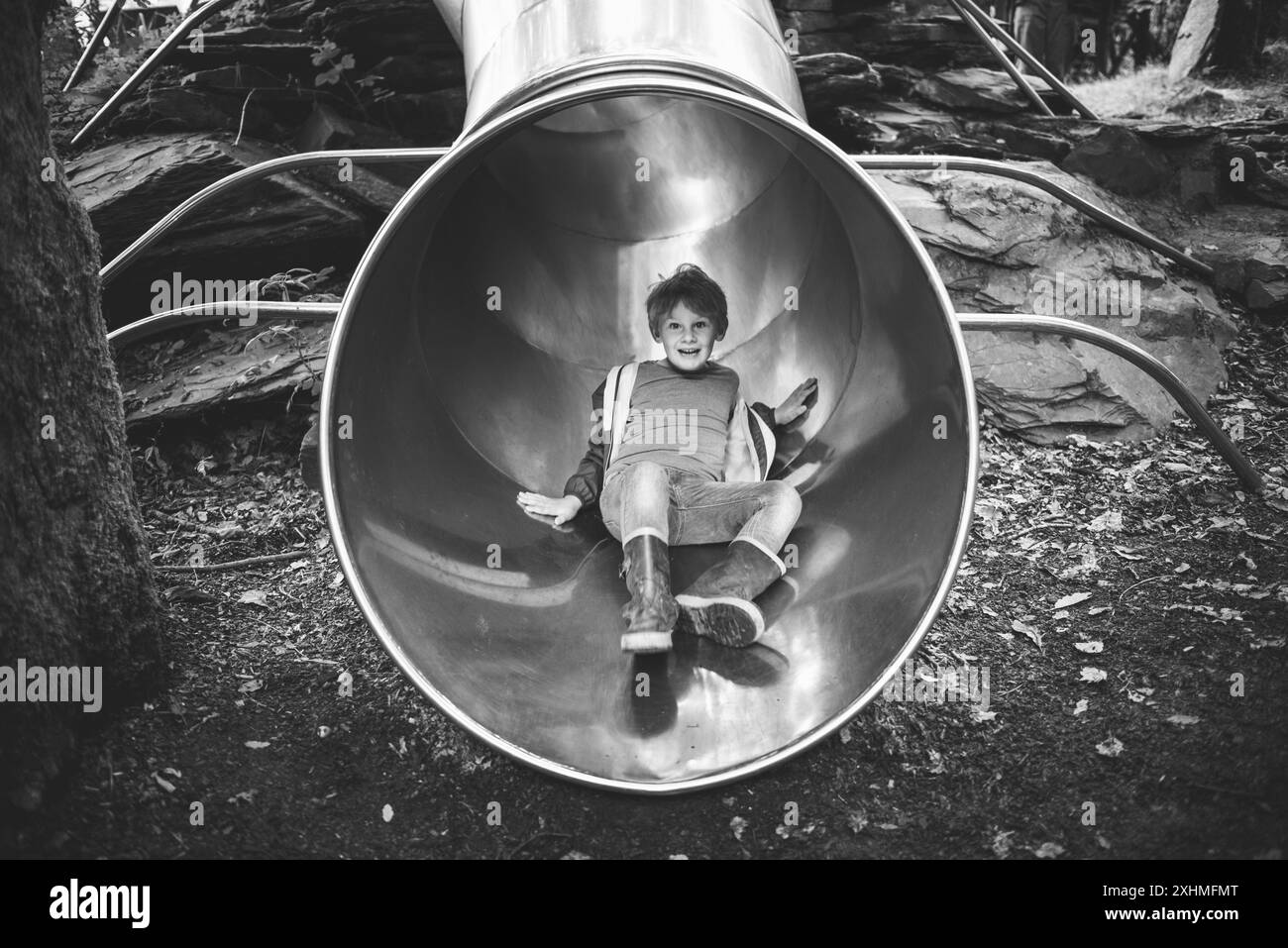 Boy at slide Black and White Stock Photos & Images - Alamy