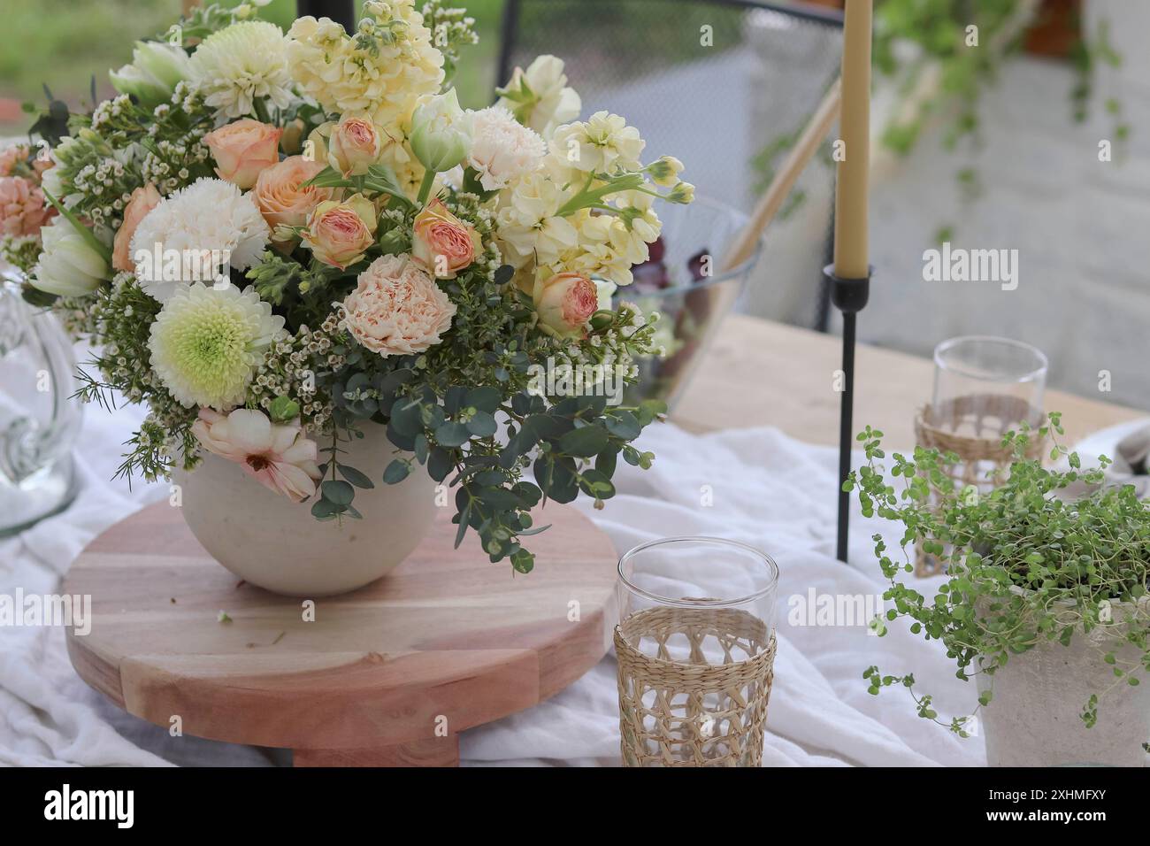 Spring Wedding Floral Centerpiece on Bridal Tablescape Stock Photo - Alamy