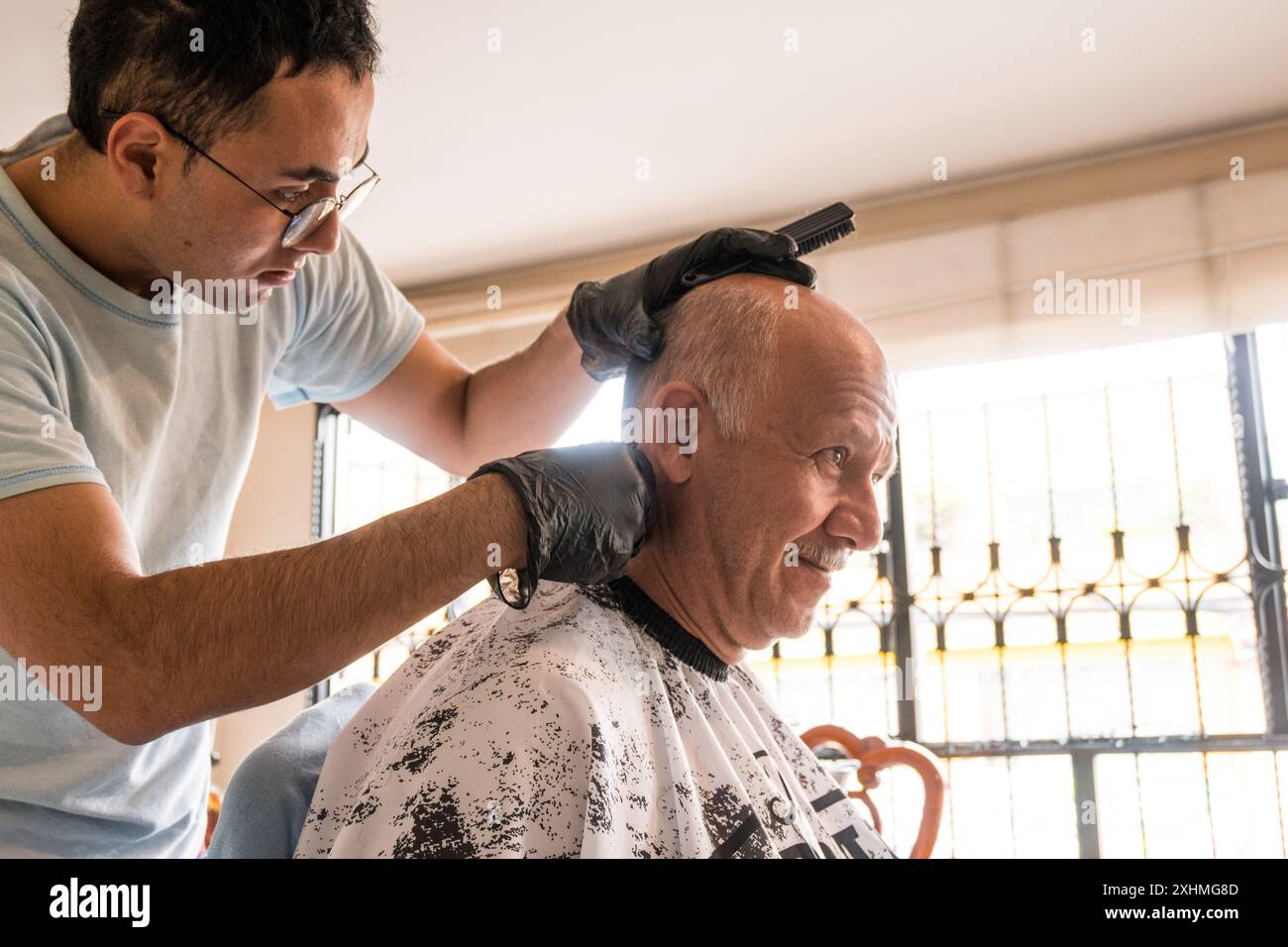 Smiling father son cutting hi-res stock photography and images - Alamy
