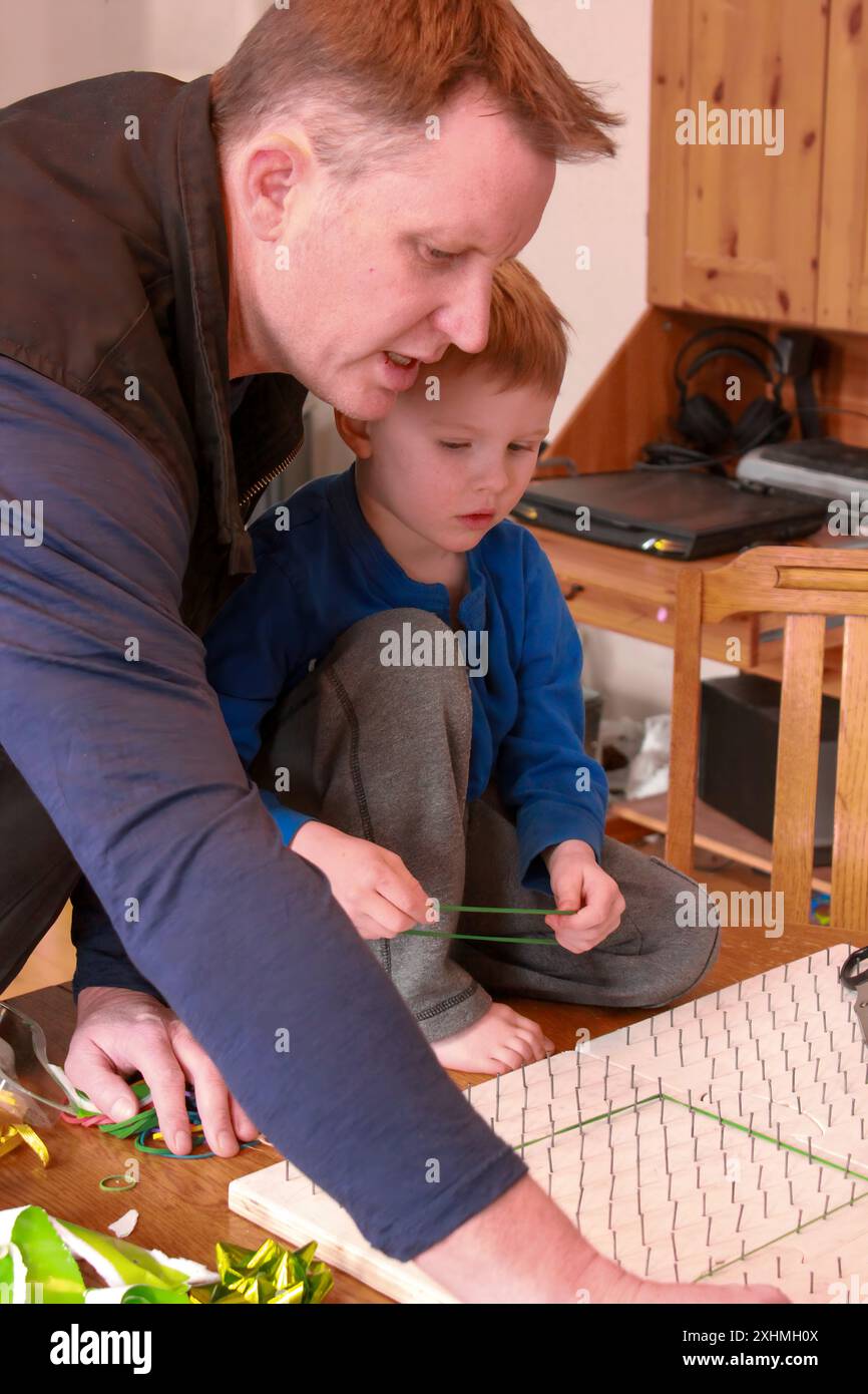 Father son bonding doing project hi-res stock photography and images ...