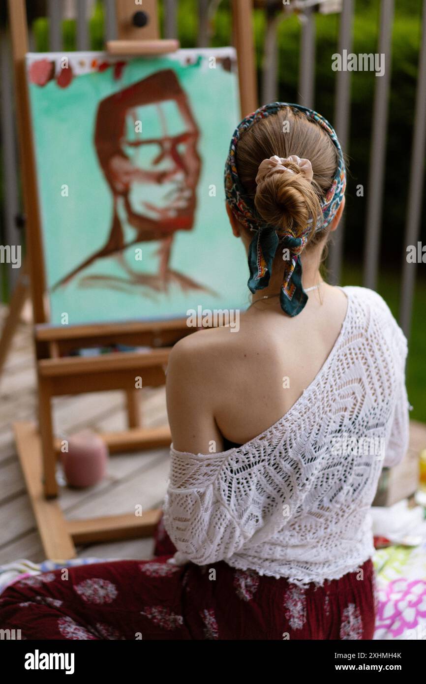 Female artist paints painting on hi-res stock photography and images ...