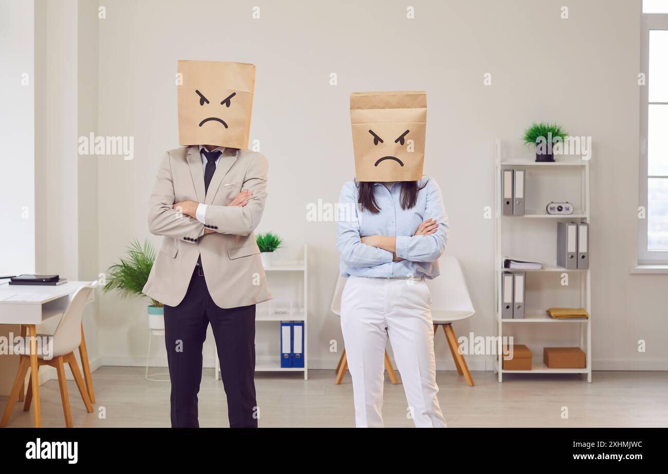 Angry Colleagues Expressing Negative Emotions With Paper Bags On Heads ...