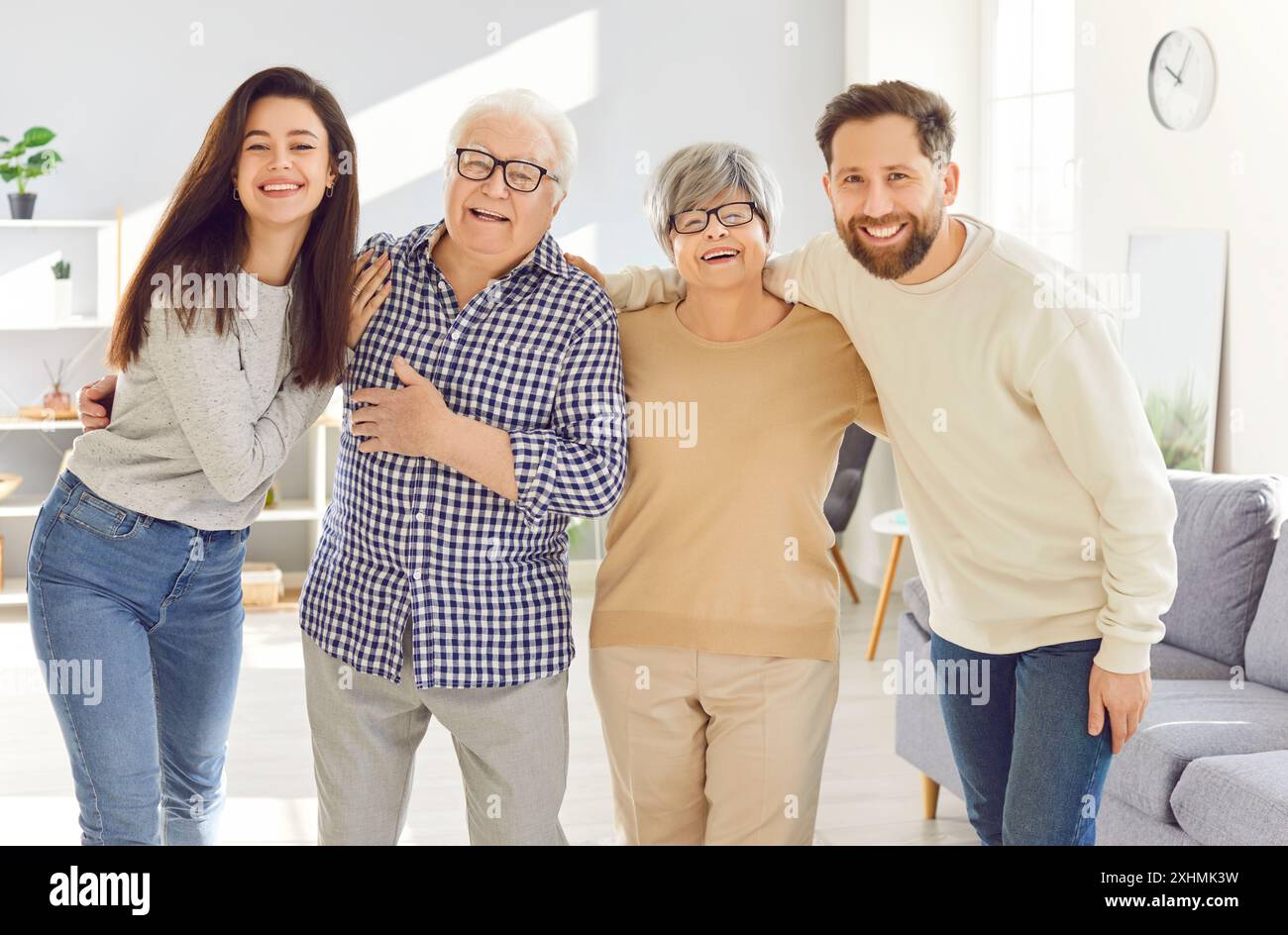 Happy family portrait, aging old parents and adult children smiling ...