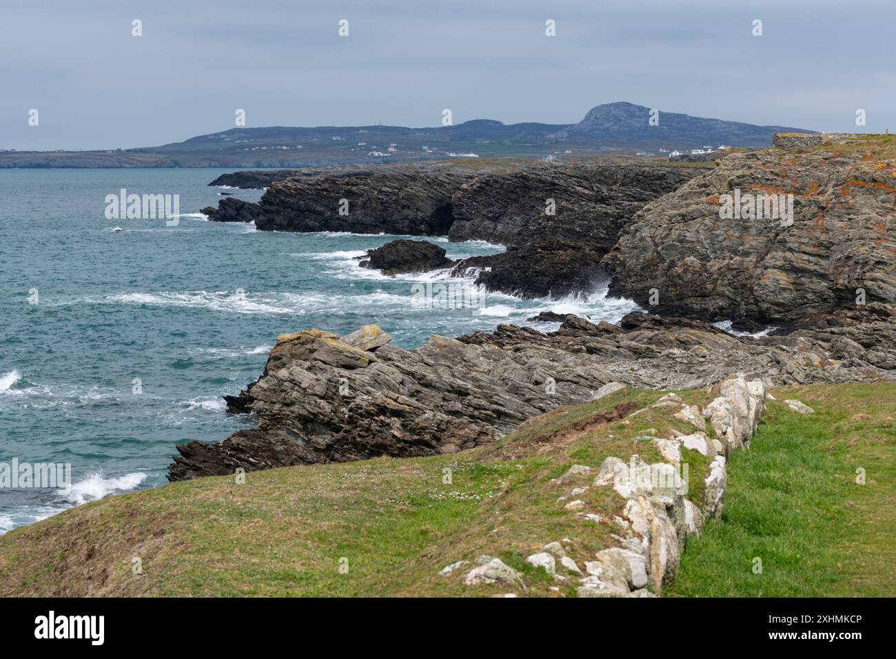 Rugged coastline near Rhoscolyn on the island of Anglesey, North Wales ...