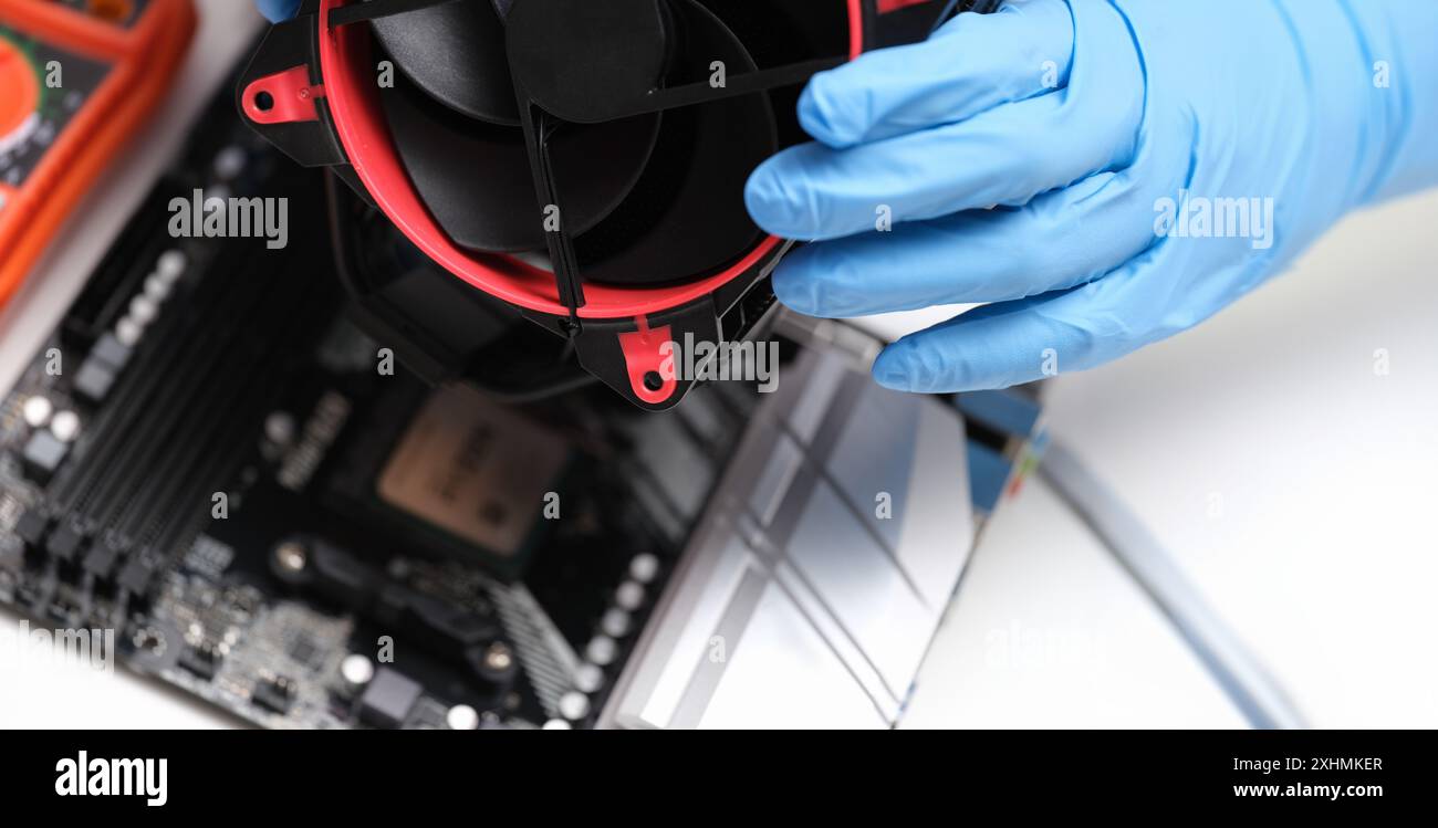 Technician cleaning motherboard man in hi-res stock photography and images - Alamy