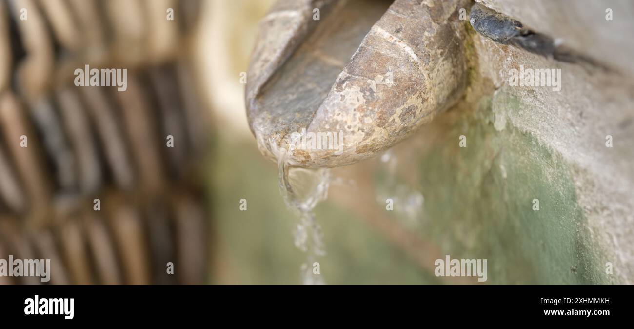 Water source in mountain, spring water or well-water Stock Photo - Alamy