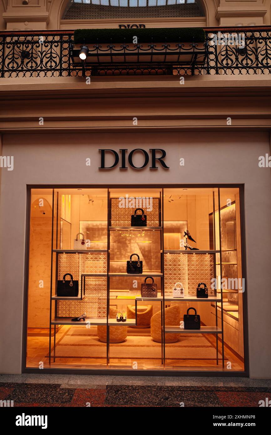 Facade of the famous luxury boutique Dior, showcase with fancy bags ...