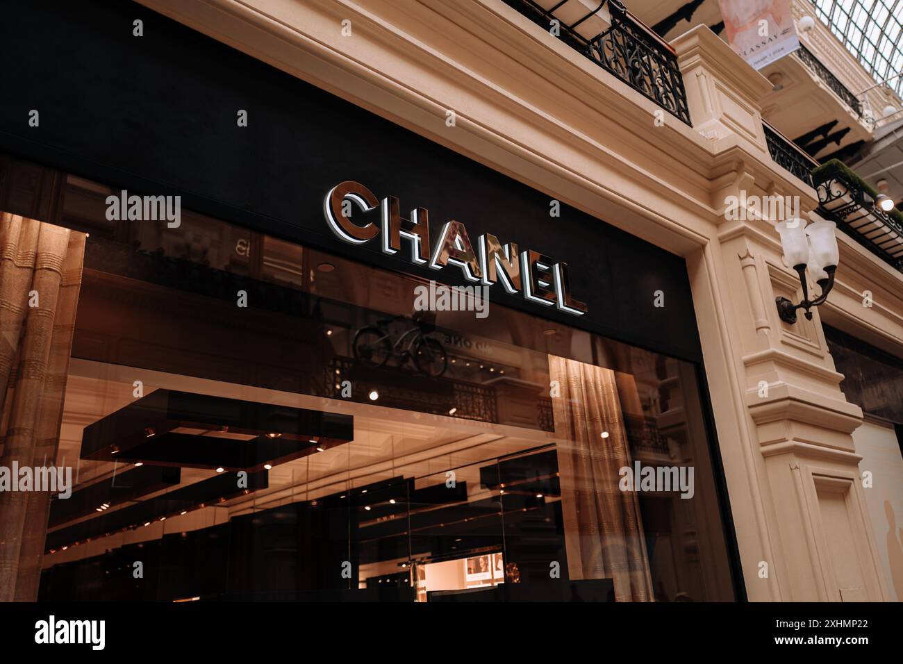 Golden black Chanel logo and entrance, Luxury boutique logotype. Chanel ...
