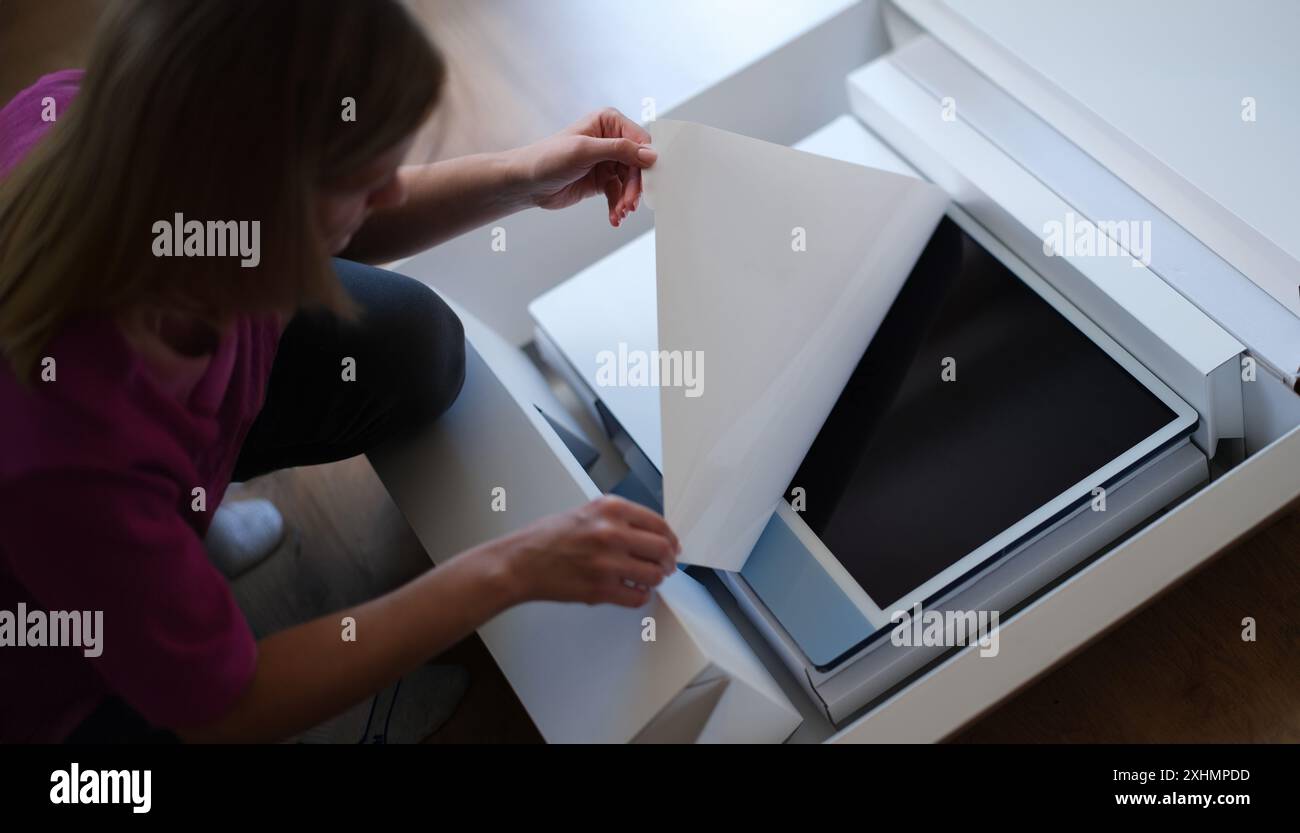 Woman hands unpacking box with modern personal computer Stock Photo - Alamy
