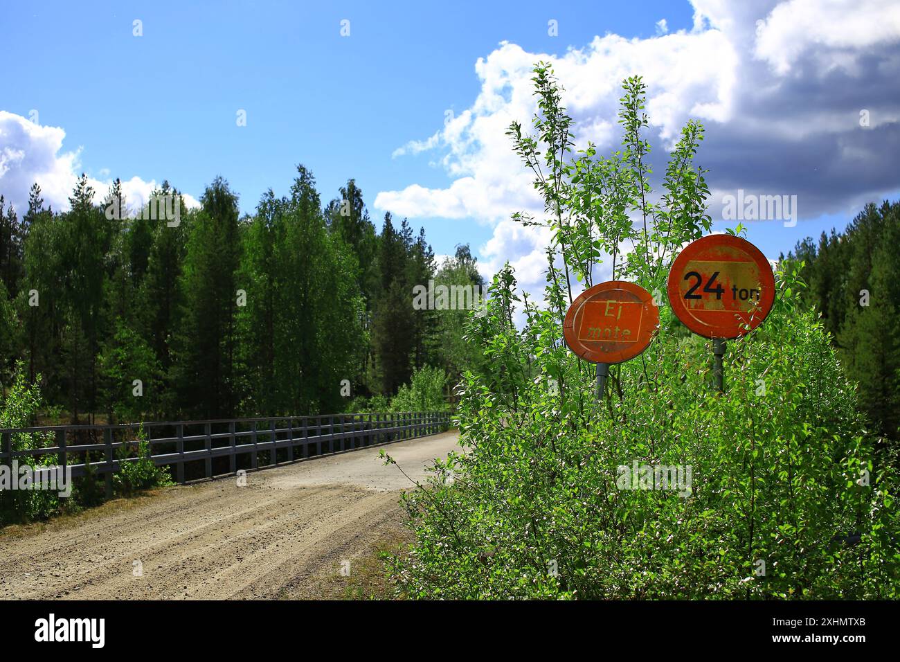Bridge and old Swedish traffic signs (Ej mote - no passing, 24 tons ...