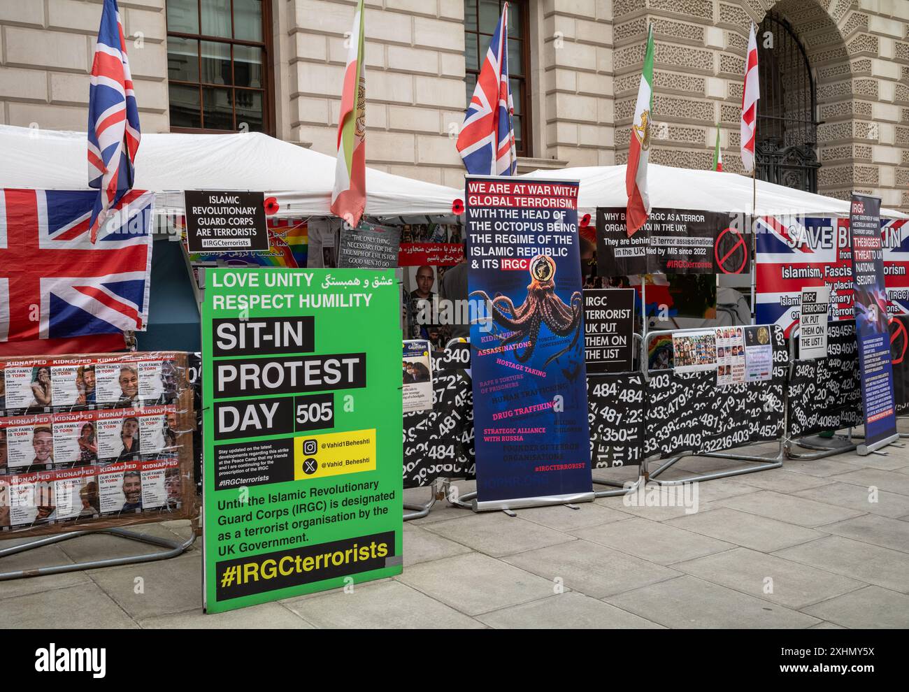 London / UK - Jul 11 2024: Posters and slogans at the anti-Iranian ...