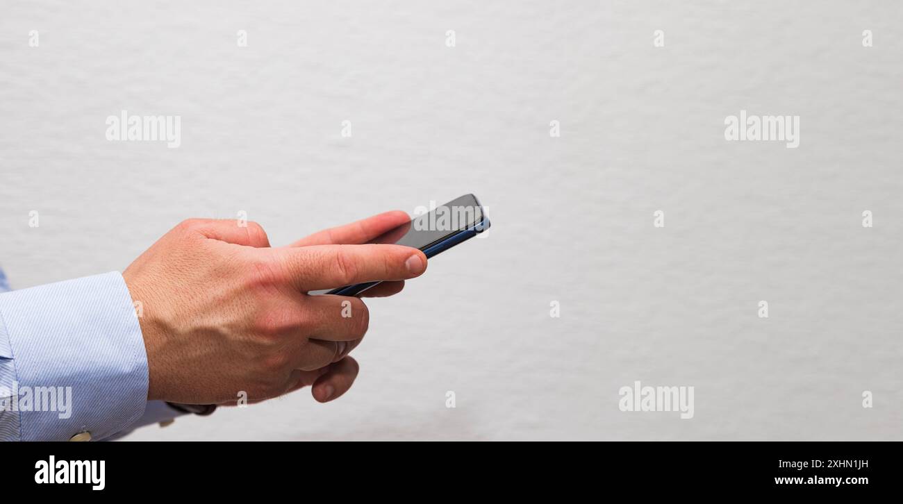Pointing phone at a wall hi-res stock photography and images - Alamy
