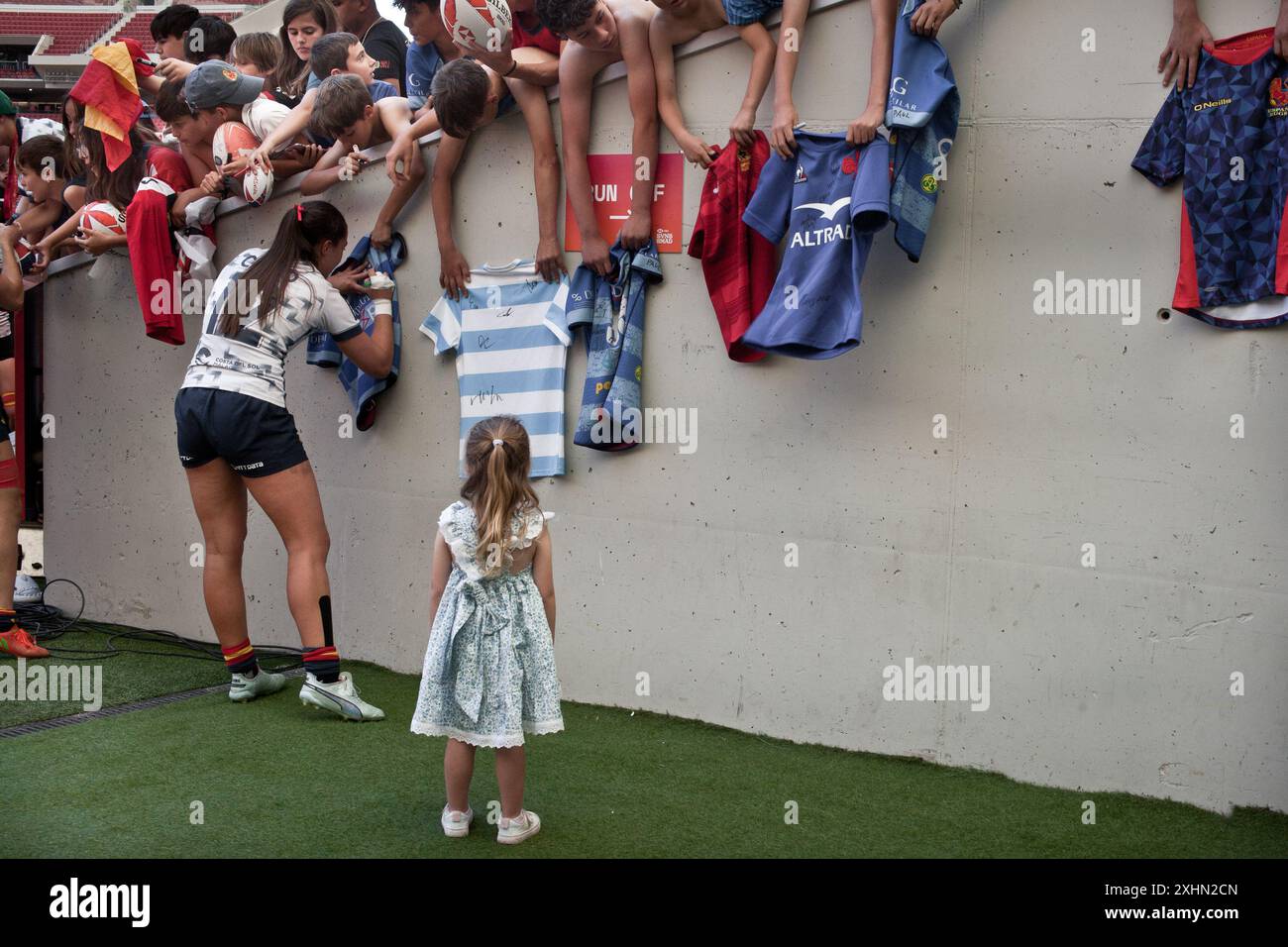 A player of the Spanish female Rugby Sevens national team signing rugby ...