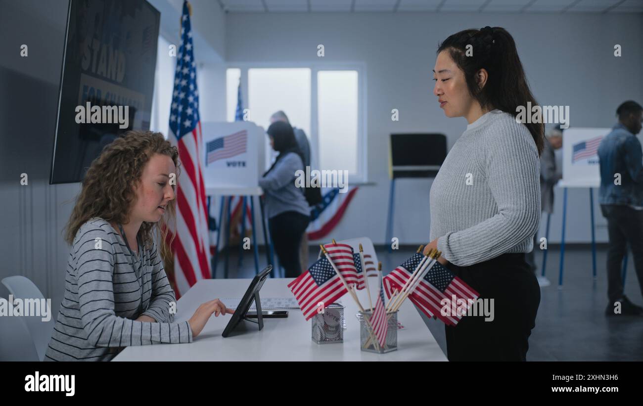Asian female voter stands hi-res stock photography and images - Alamy