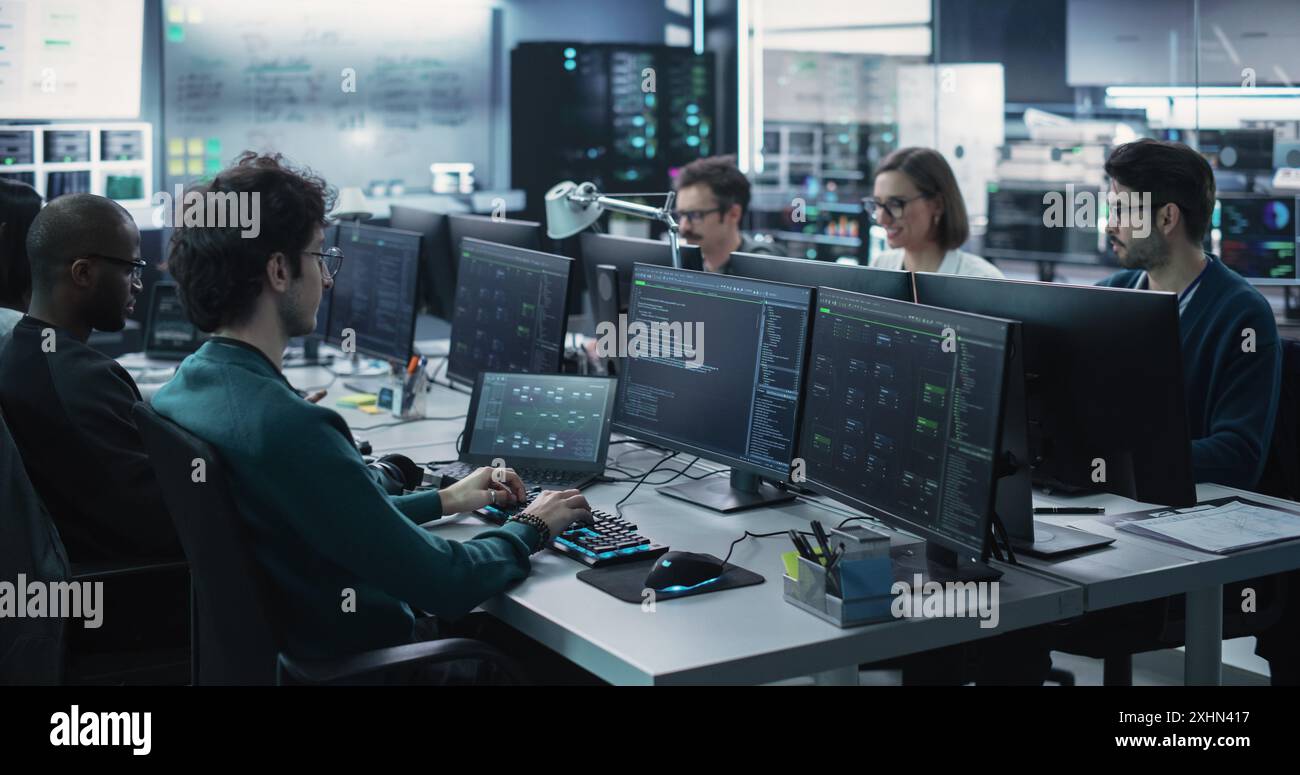 Group of Empowered Multicultural Men and Women Working in a Research ...