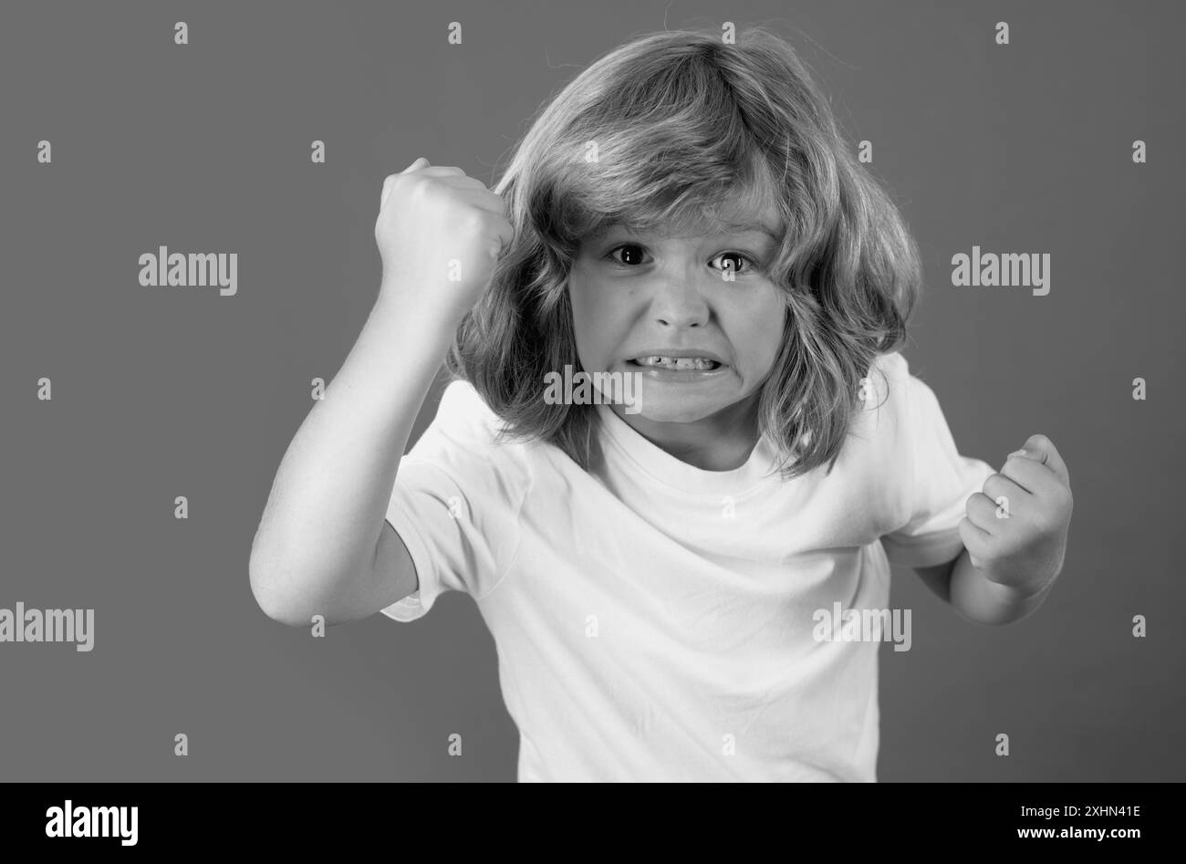 Kid boy with angry expression. Angry hateful little boy, child furious ...