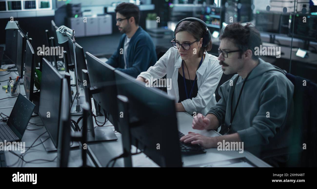 Young Team of Specialists Working on Desktop Computers and Having a ...