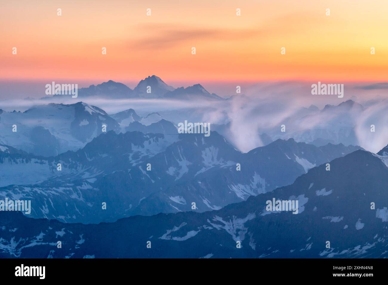 Colorful Sunset in Mountains Stock Photo - Alamy
