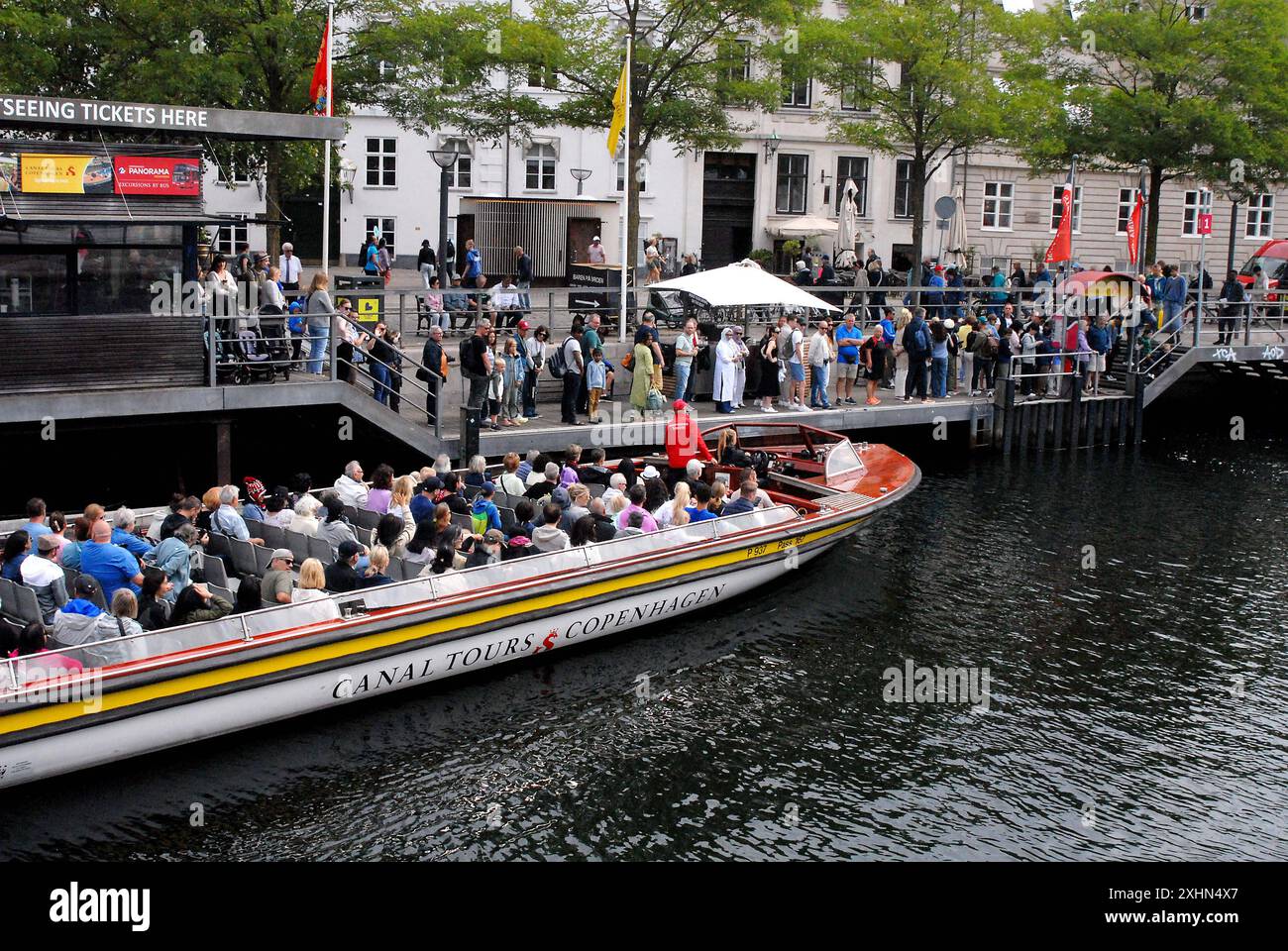 Copenhagen/ Denmark/15 July 2024/ Travelers boat ride canal tours ...