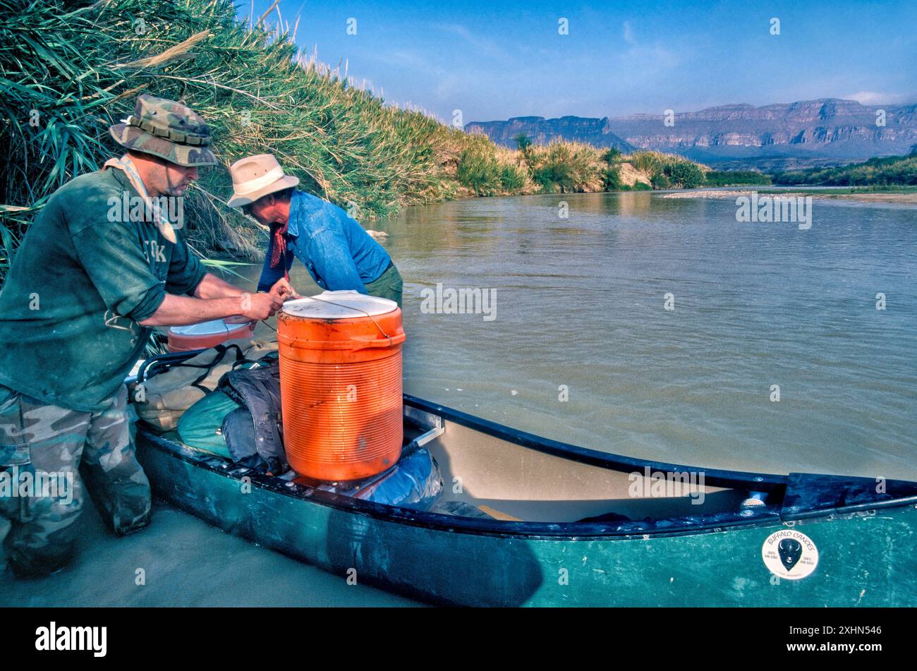 Canoeists filling water containers at hot springs, The Lower Canyons of ...