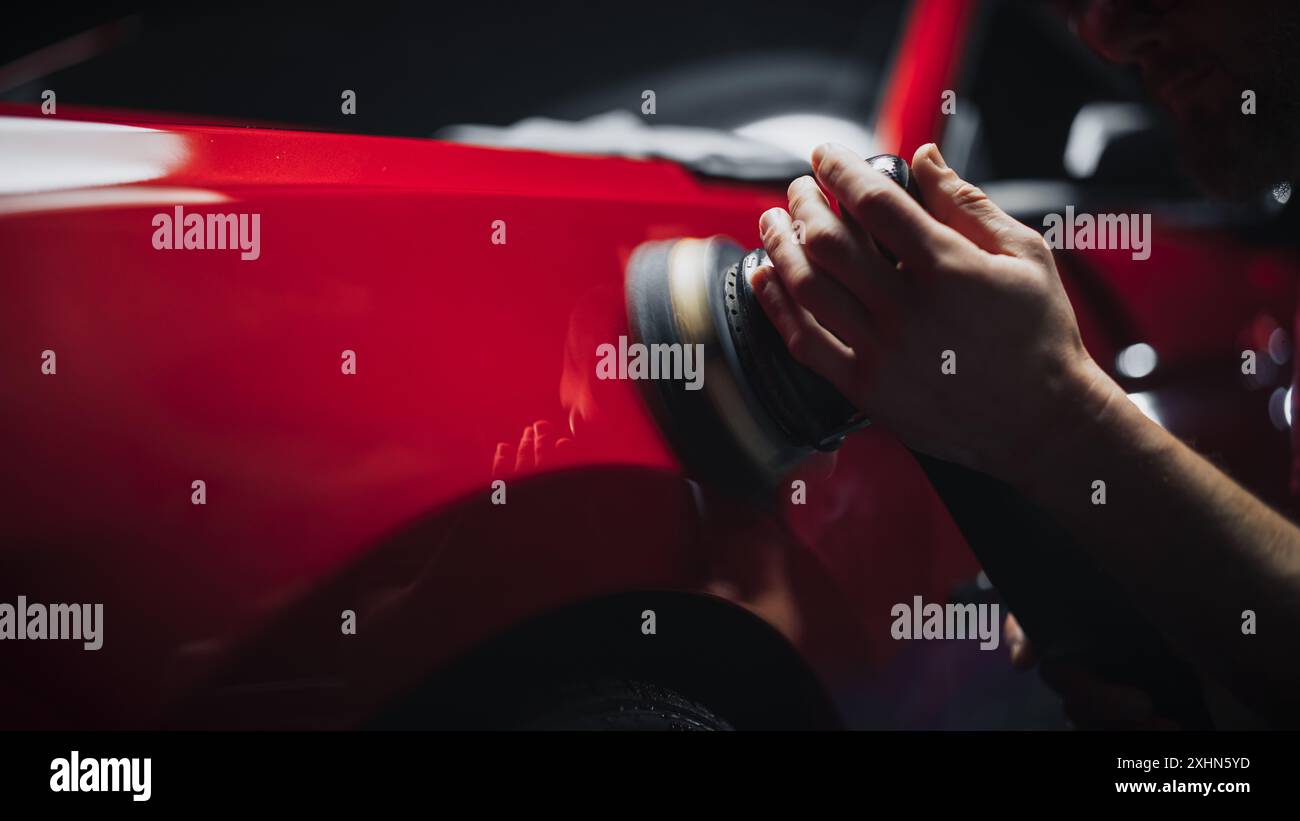 Professional car detailer cleaning red hi-res stock photography and ...