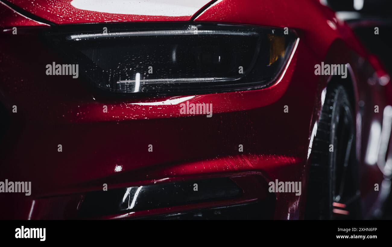 Red sportscar in car wash hi-res stock photography and images - Alamy