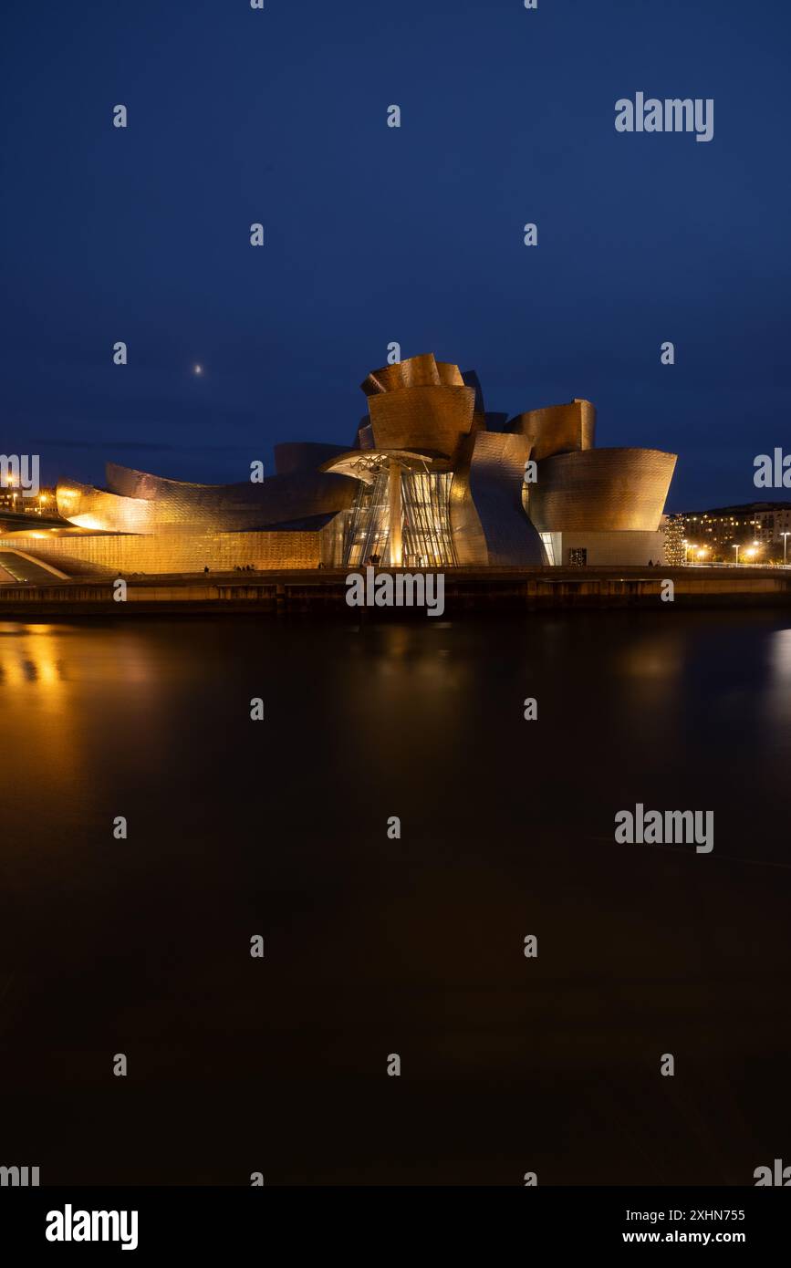 Bilbao, Spain, July 12, 2024 - At night, the Guggenheim Museum in ...
